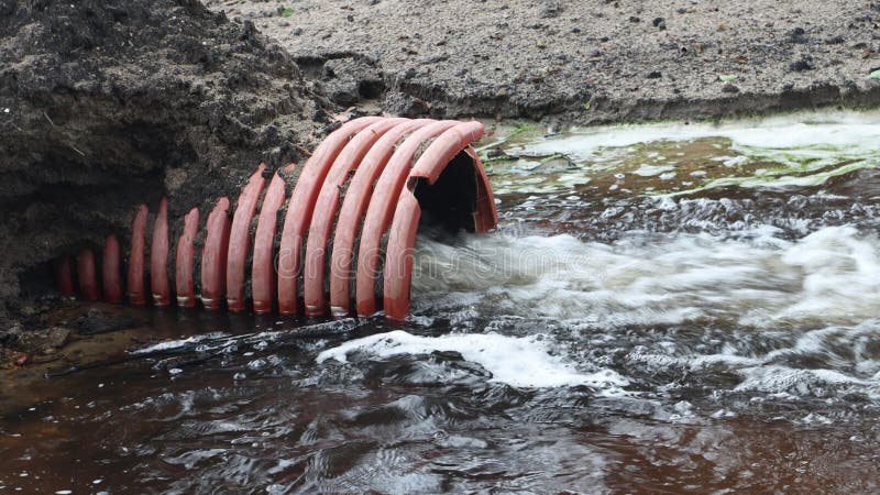 A Stream of Water Flows from a Large Flexible Pipe - Hose Stock Video ...