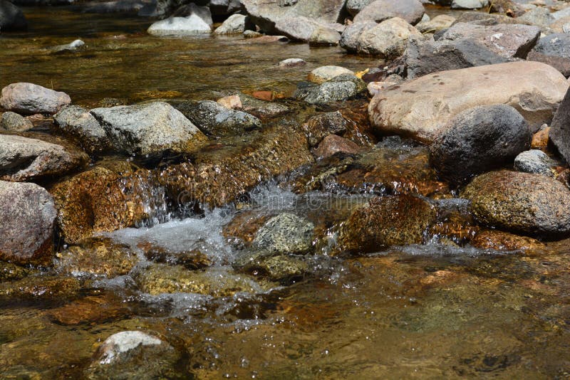Stream Water Flows Over Rocks Stock Photo - Image of stone, water: 59001918 Stream Water Flows Over Rocks Stock Photo - Image of stone, water: 59001918