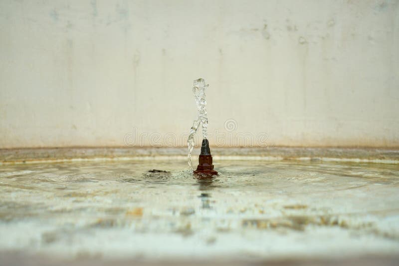 A Stream of Water from a Fountain in Rome. Stock Photo - Image of ...
