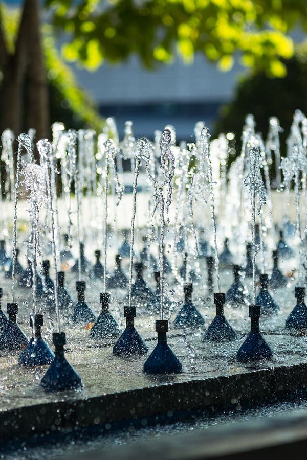 A Stream of Water Splashing Drops Stock Image - Image of condensation ...