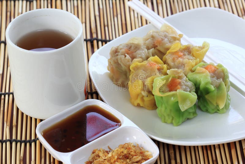 Streamed Dumpling and Cup of Tea Stock Image - Image of chopsticks ...