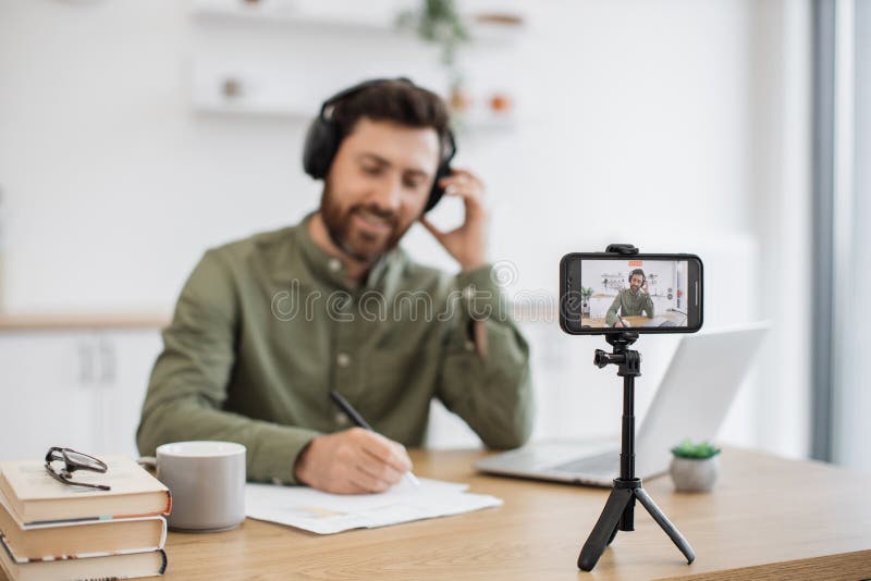 Streamer Using Devices and Making Notes at Home Office Stock Image ...
