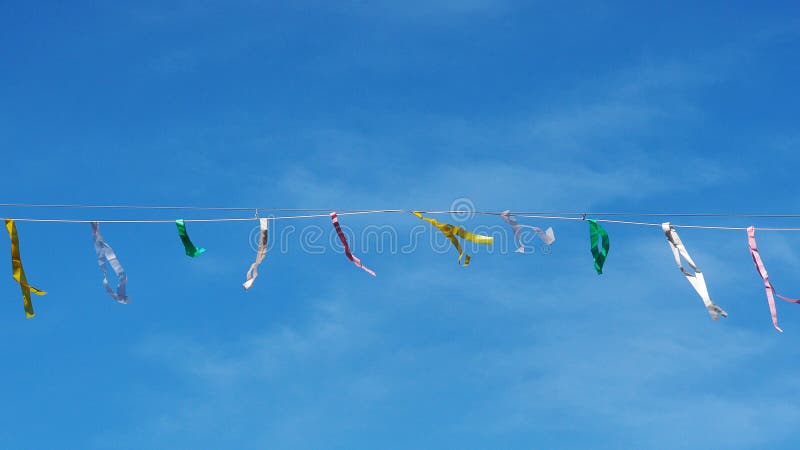 Streamers on a line stock image. Image of yellow, white - 144600817