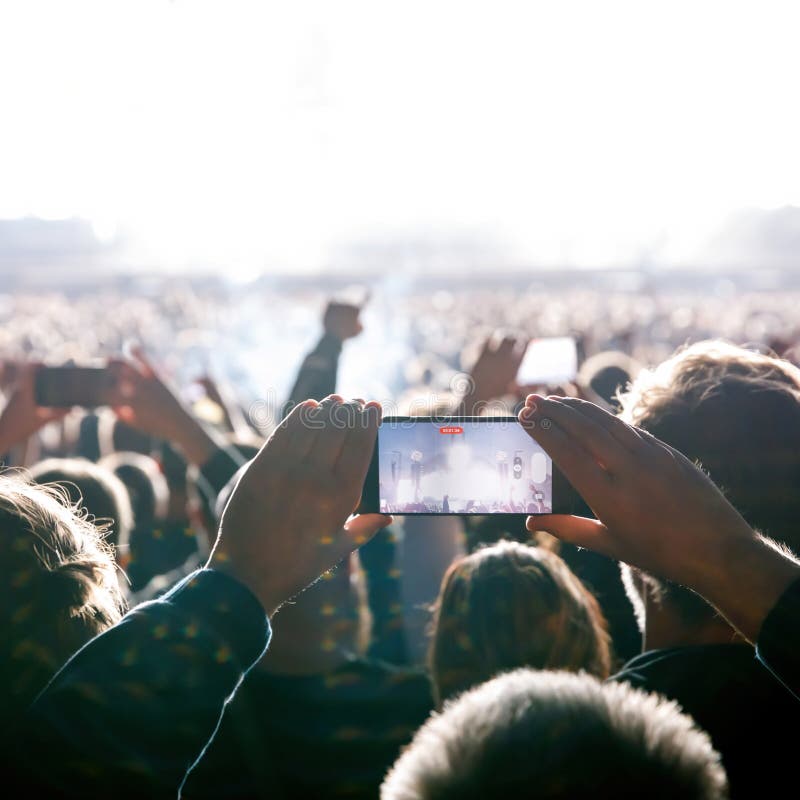 Streaming from the Dance Floor Via Mobile Phone. Concert Show Editorial ...