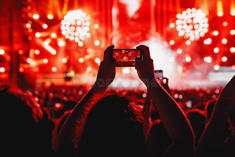 Streaming from the Dance Floor Via Mobile Phone. Concert Show Editorial ...