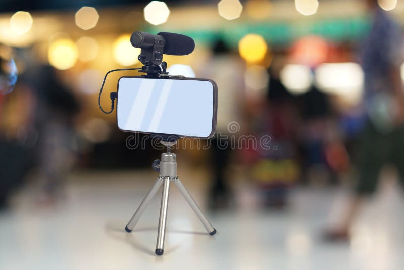 Streaming Video Live with Smart Phone and Microphone Stock Image ...