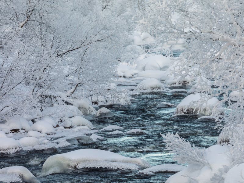 A Streaming Winter Creek, Snow and Ice, River Surrounded with Snow ...