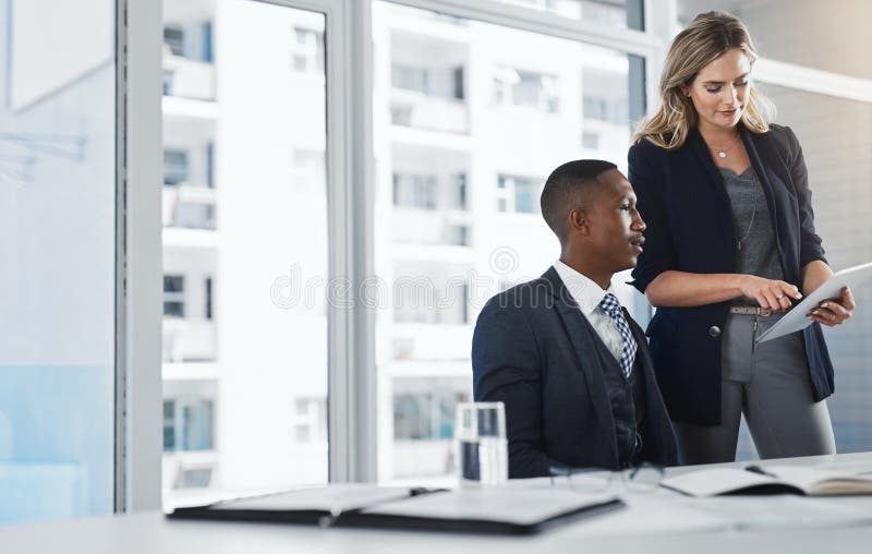 Streamlining Tasks with the Smartest of Technology. Two Businesspeople ... Streamlining Tasks with the Smartest of Technology. Two Businesspeople ...