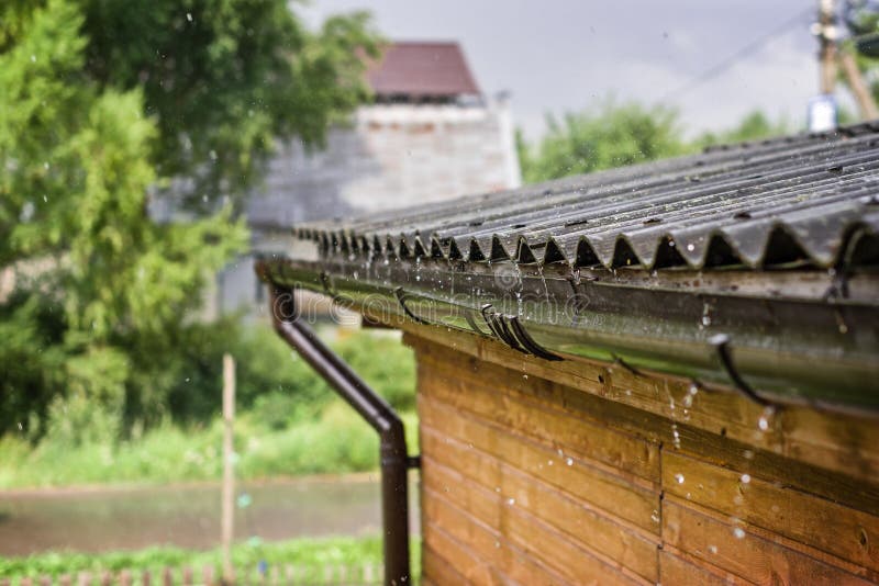 Streams of Rain are Flowing Down from the Roof. Stock Photo - Image of ...