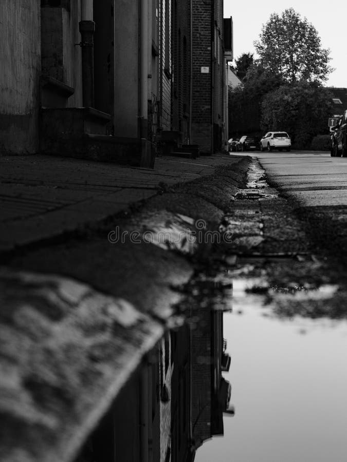 Street Art View Though a Rain Reflection Stock Image - Image of light ...