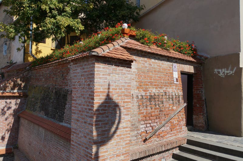 Street with brick walls stock image. Image of blue, romania - 33446337