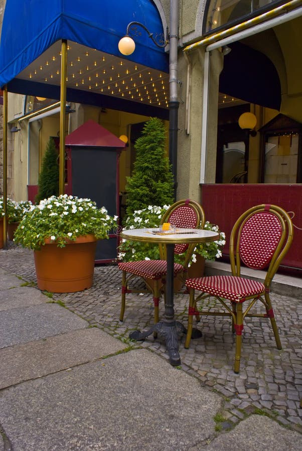 European outdoor cafe stock photo. Image of brick, parasol - 9887916