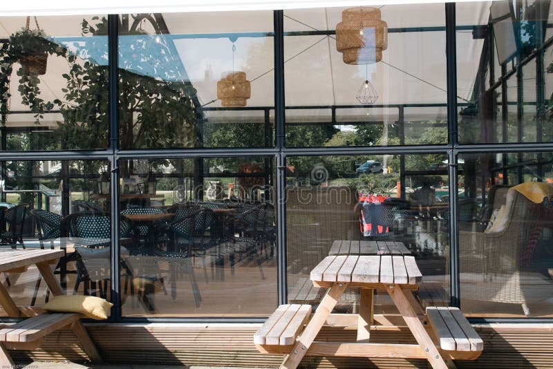 Street Cafe in a Modern Black Building in a Sunny Day Editorial Stock ...