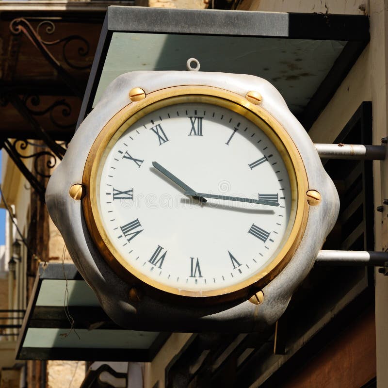Street clock stock image. Image of minute, metal, hanging - 93581245