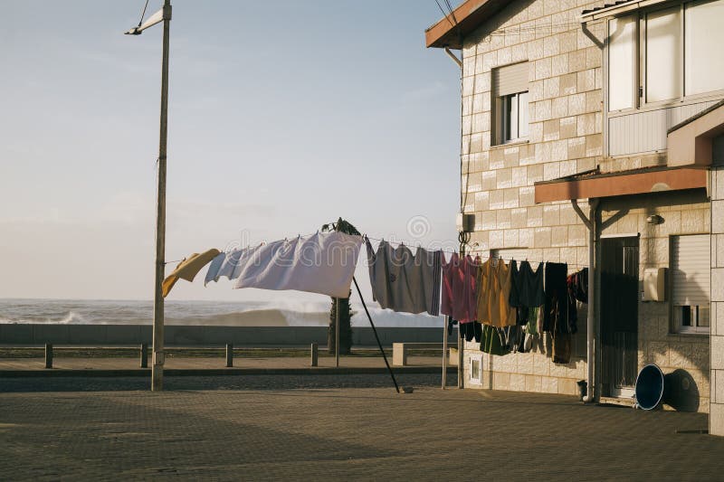 Street Clothesline on Against Blue Sky and Wavy Coast Stock Image ...