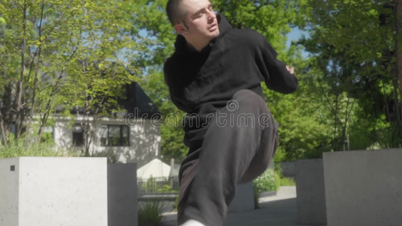 A Street Dancer Performs Dynamic Freestyle, Blending Various Street ...