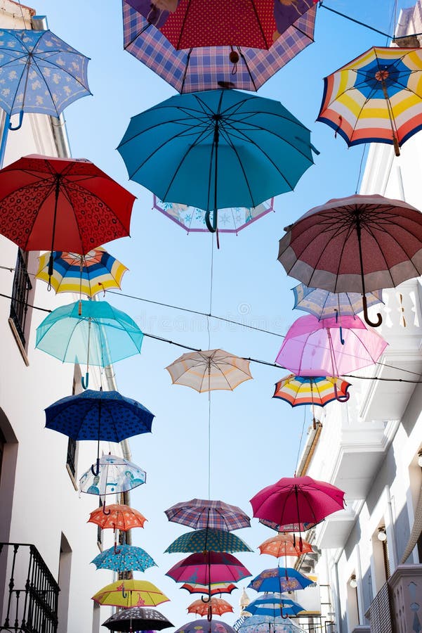Street Decorated with Umbrellas of Different Colors. Concept of ...