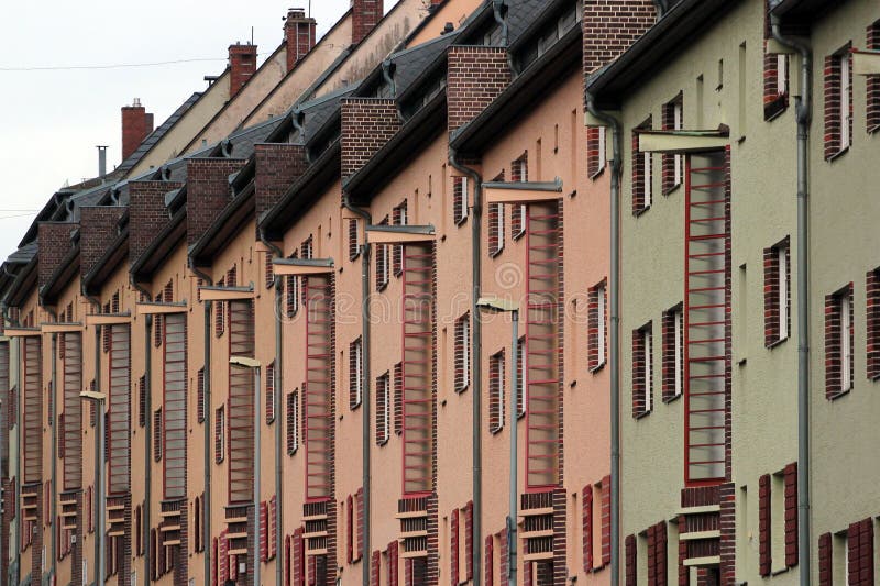 Street with Facades of Many Identical Buildings Stock Photo - Image of ...