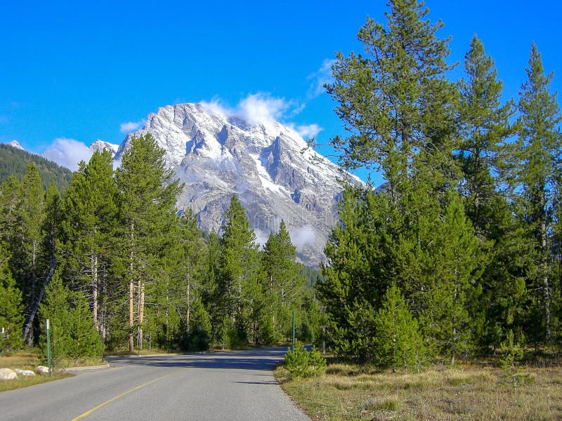 A Street in Front of the Rocky Mountains Stock Image - Image of ...