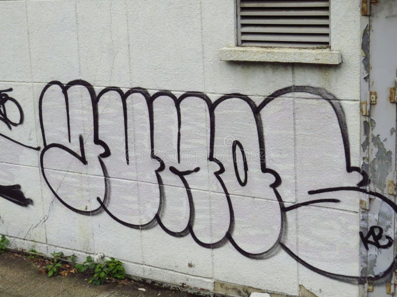 A Street Graffiti, Abstract Words on the Wall Editorial Photography ...