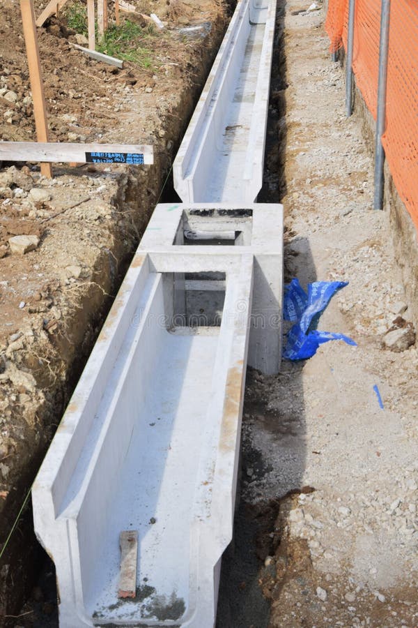 Street gutter construction stock photo. Image of concrete - 135171390