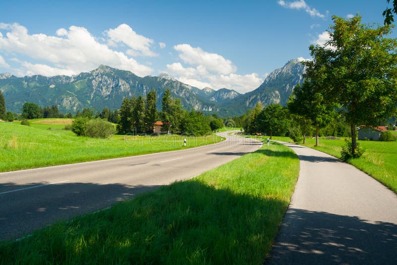 Street heading to the alps stock image. Image of quiet - 26670253