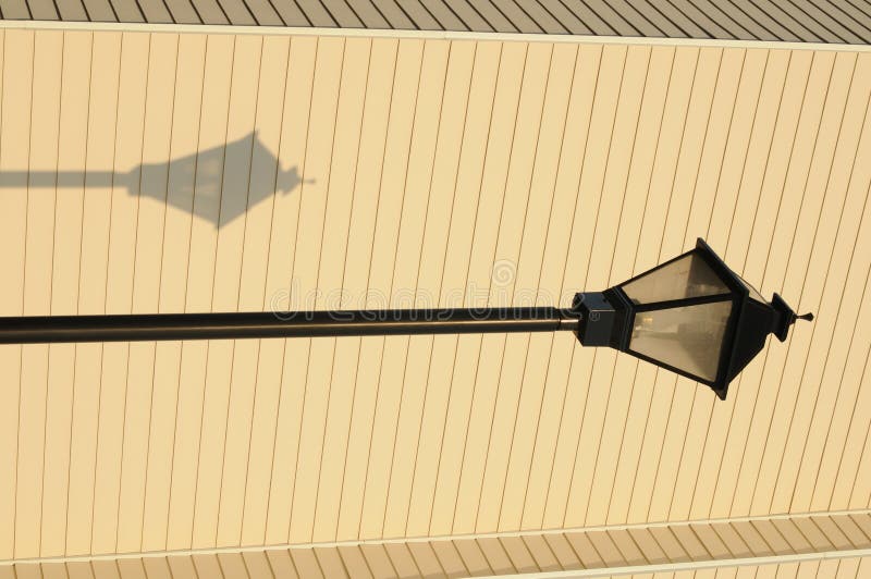 Street Lamp and Its Shadow stock photo. Image of building - 4936572