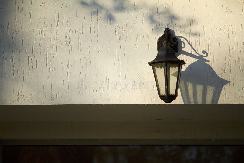 Street Lamp and Its Shadow on a White Wall Background Stock Image ...