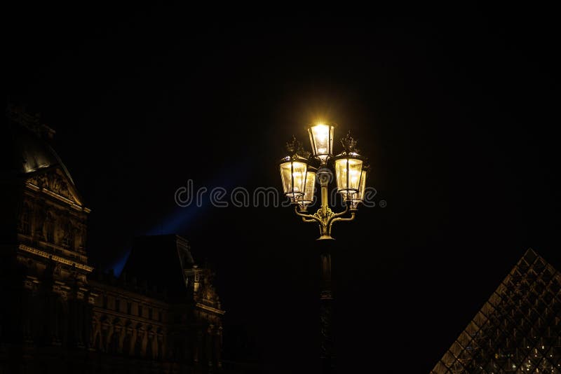 A Street Lamp is Lit Up in the Dark Stock Image - Image of black ...