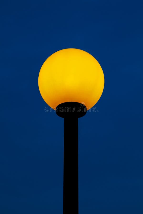 Street Lamp Lit with Yellow Light Stock Photo - Image of central ...