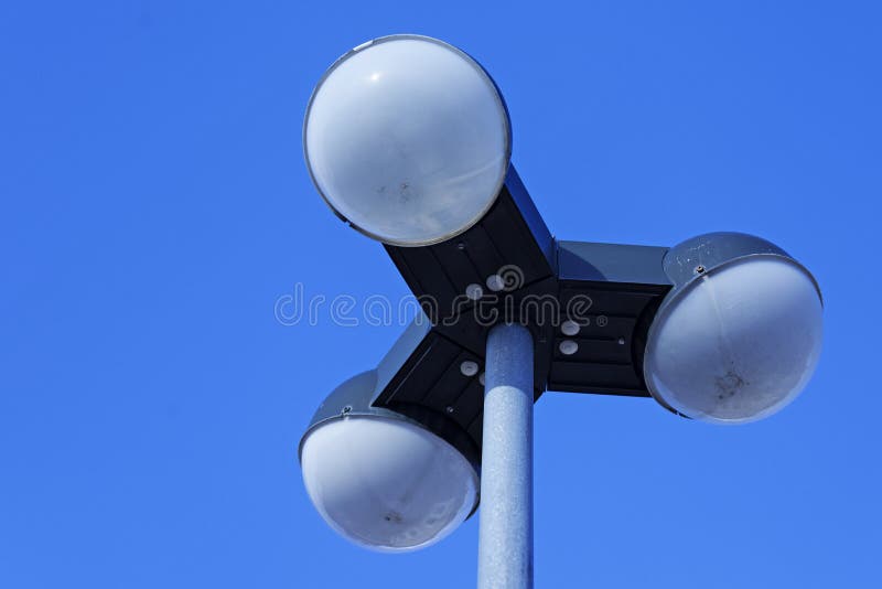 A Street Lamp that Looks Very Different with Three Light Sources Stock ...