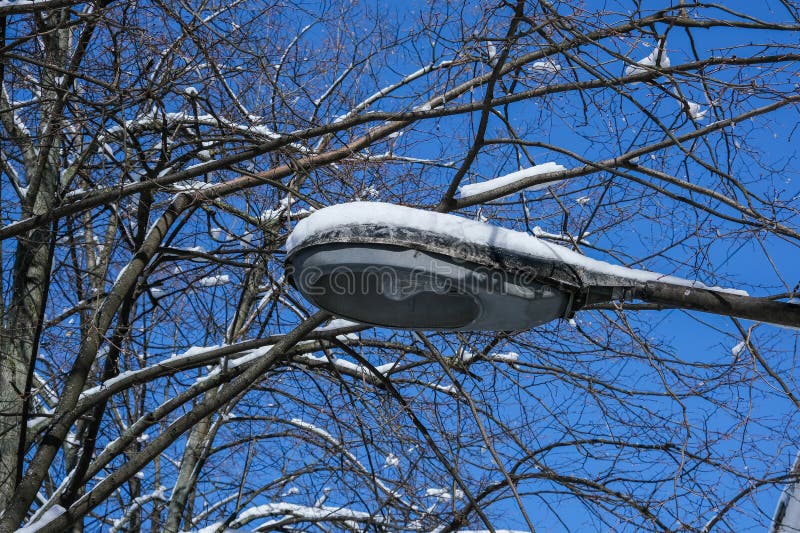Street Lamp with an Outdated Light Bulb Stock Image - Image of snow ...
