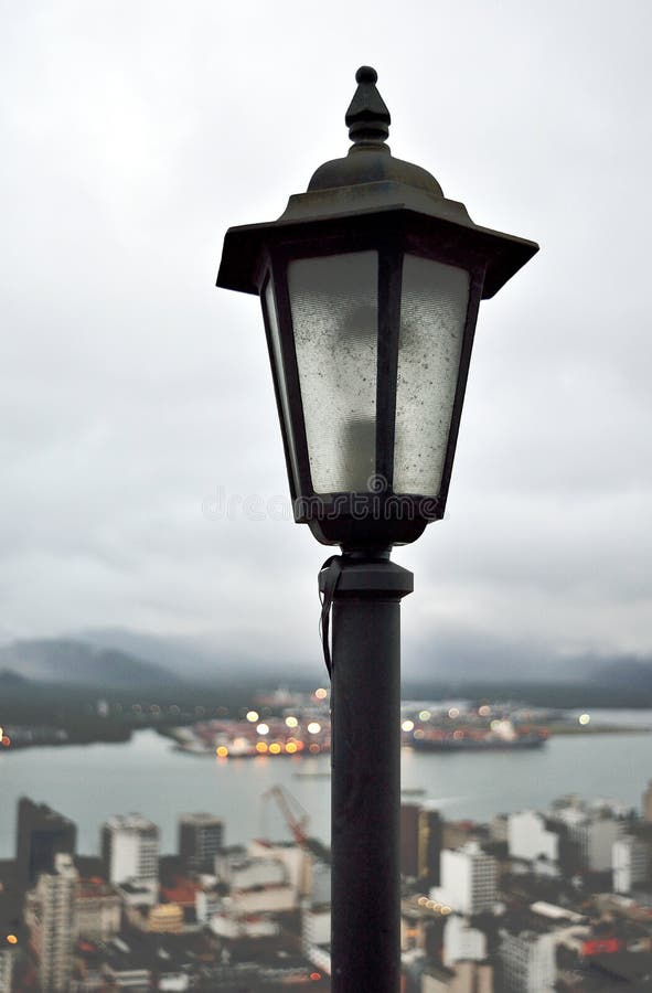 Street Lamp Post French Style with a City in Second Plan Stock Photo ...