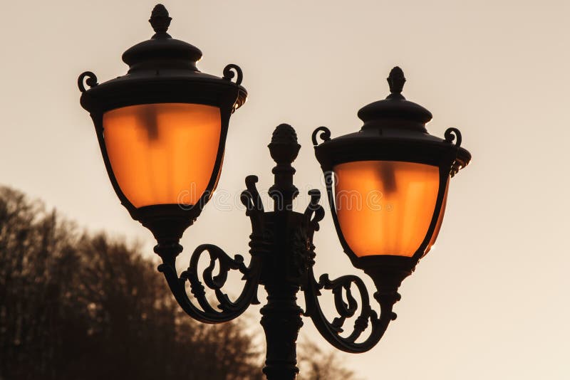 Street Lamp in the Rays of the Setting Sun Stock Photo - Image of ...