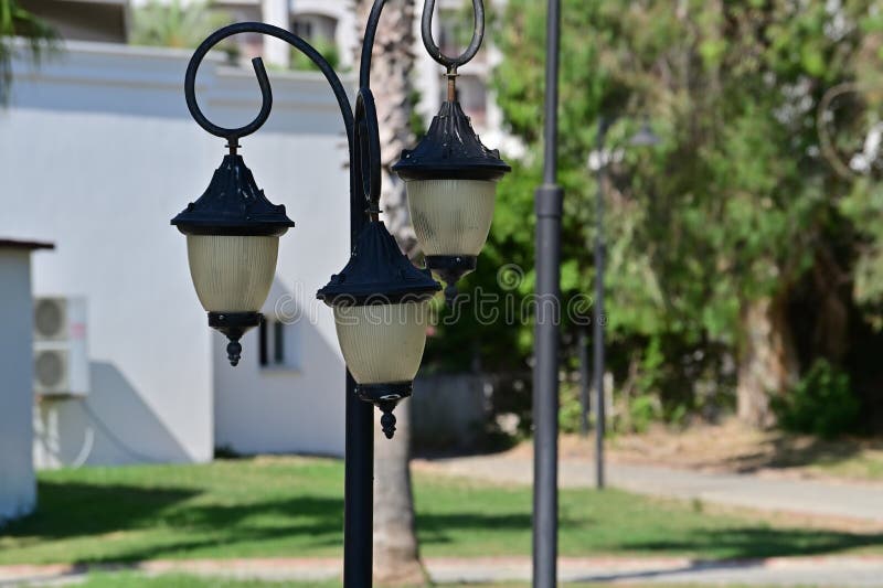 Street Lamp with Three Shades on the Road Stock Photo - Image of ...