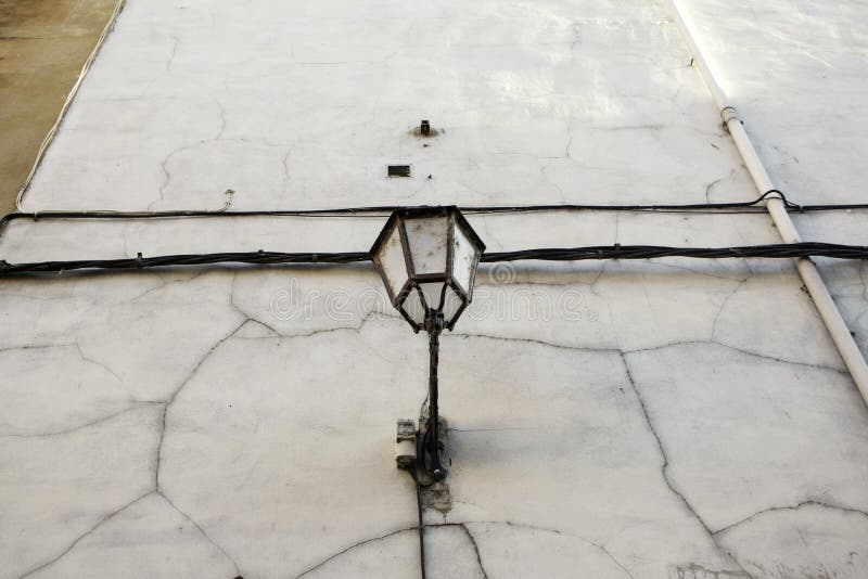 Street lamp in urban wall stock photo. Image of black - 90709434