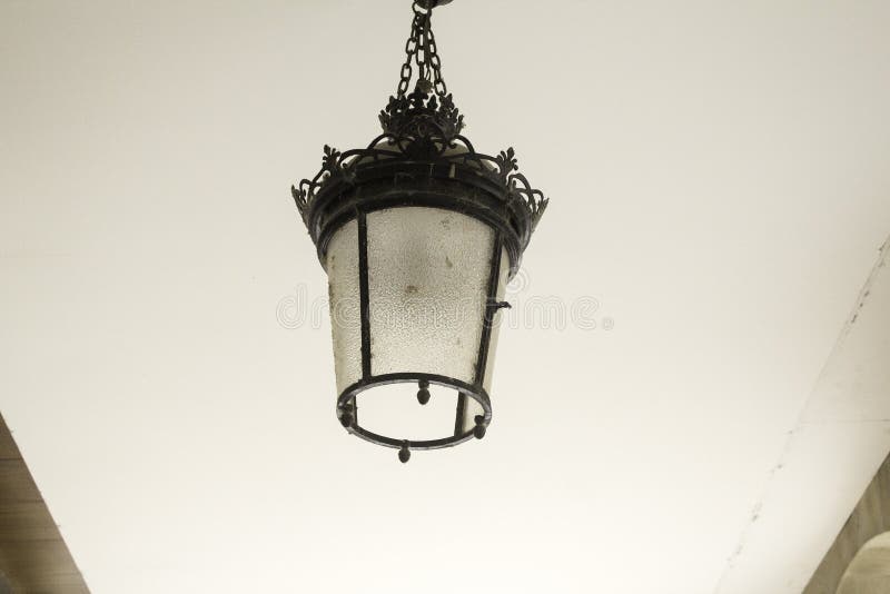 Street lamp in urban wall stock photo. Image of lantern - 90780704