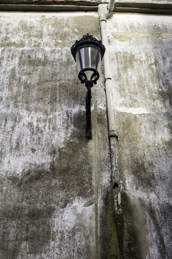 Street lamp in urban wall stock image. Image of architecture - 90066067
