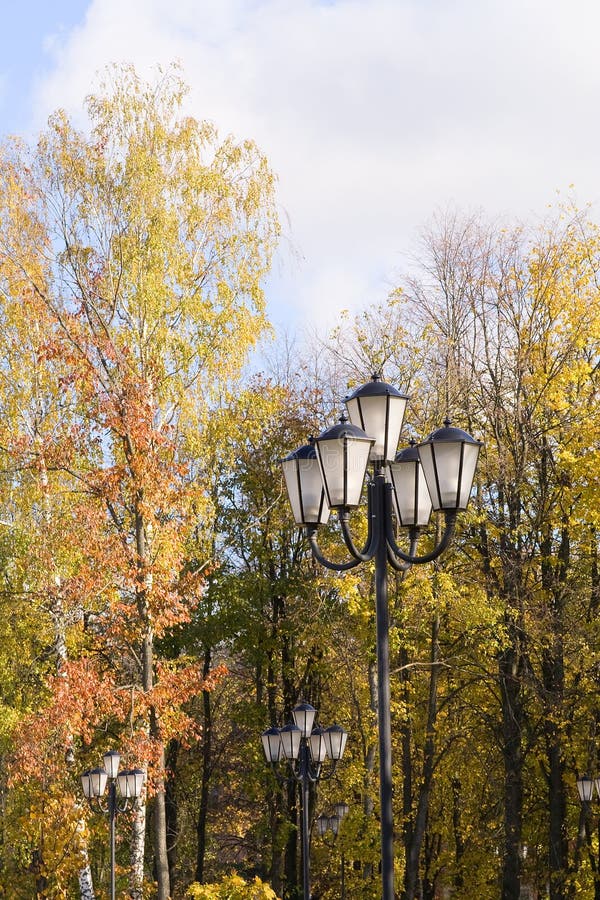 Street lamps in the park stock photo. Image of iron, street - 11389742
