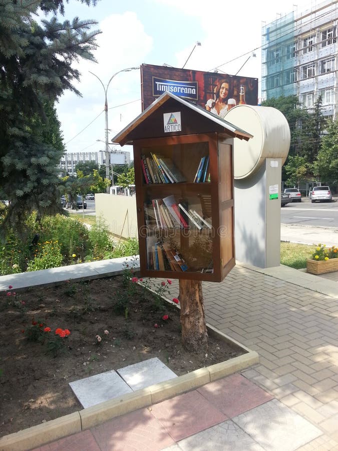 Street Library in the Form of a Little Yellow Booth with Free Books ...