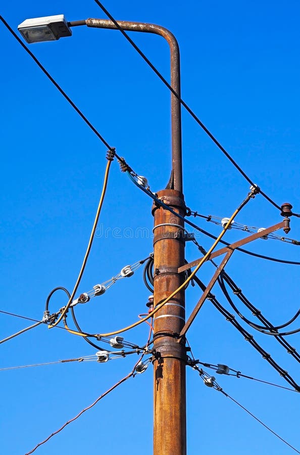 Street light with cables stock image. Image of danger - 61068903