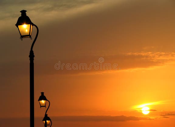 Street light and sunset stock image. Image of yellow, sunset - 2273725