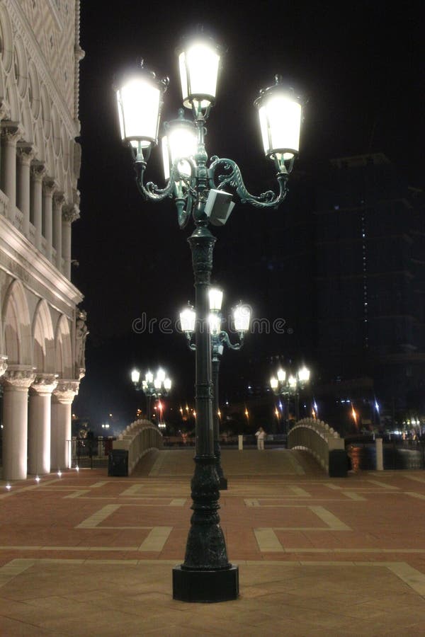 Street Lighting in the Night Stock Photo - Image of lighting, center ...