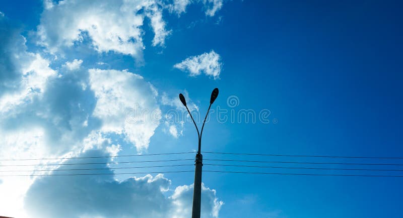 Street lights and blue sky stock image. Image of bright - 248183235