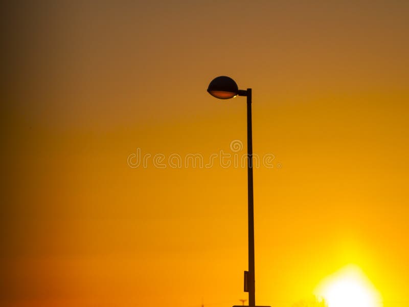 Street Lights on Sunset on and Urban Landscape Stock Photo - Image of ...