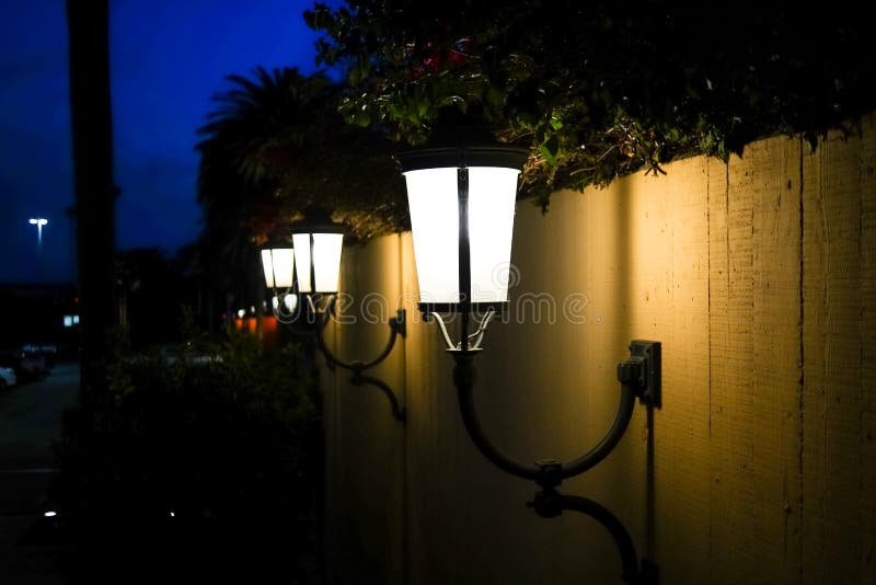 Street Lights on the Wall Illuminating the Dark Street Stock Image ...
