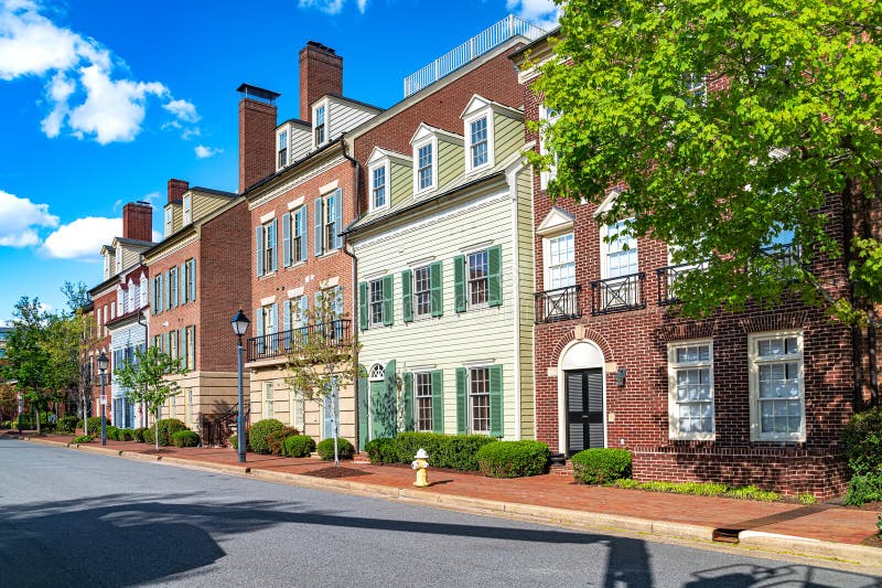 Street with Modern Brick Townhouses Lining the Road Stock Image - Image ...