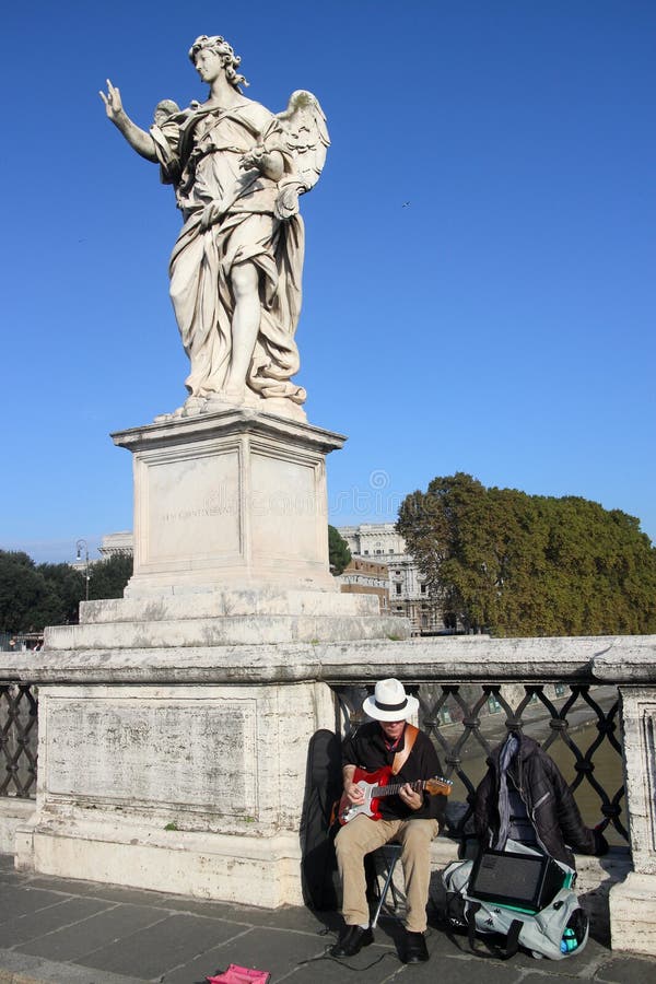Street musician in Rome editorial photography. Image of monument - 35229127