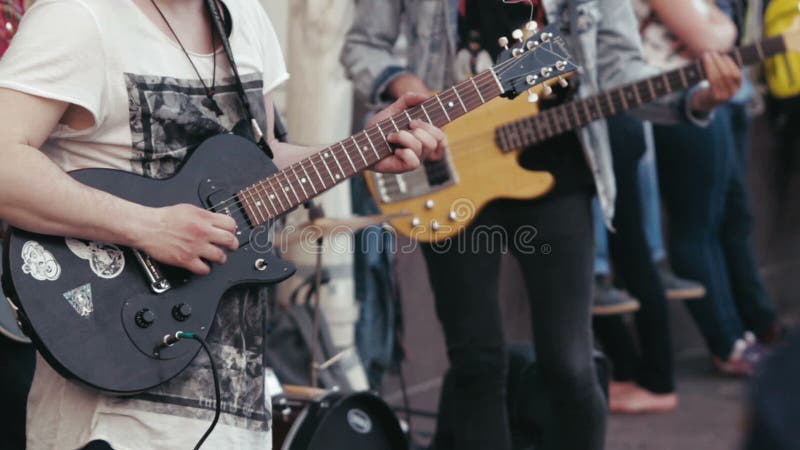 Two Musicians Playing Guitars and Recording Music in a Professional ...