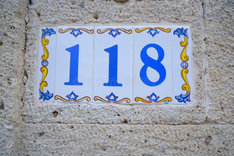 Street number number 118 stock photo. Image of violet - 272467104